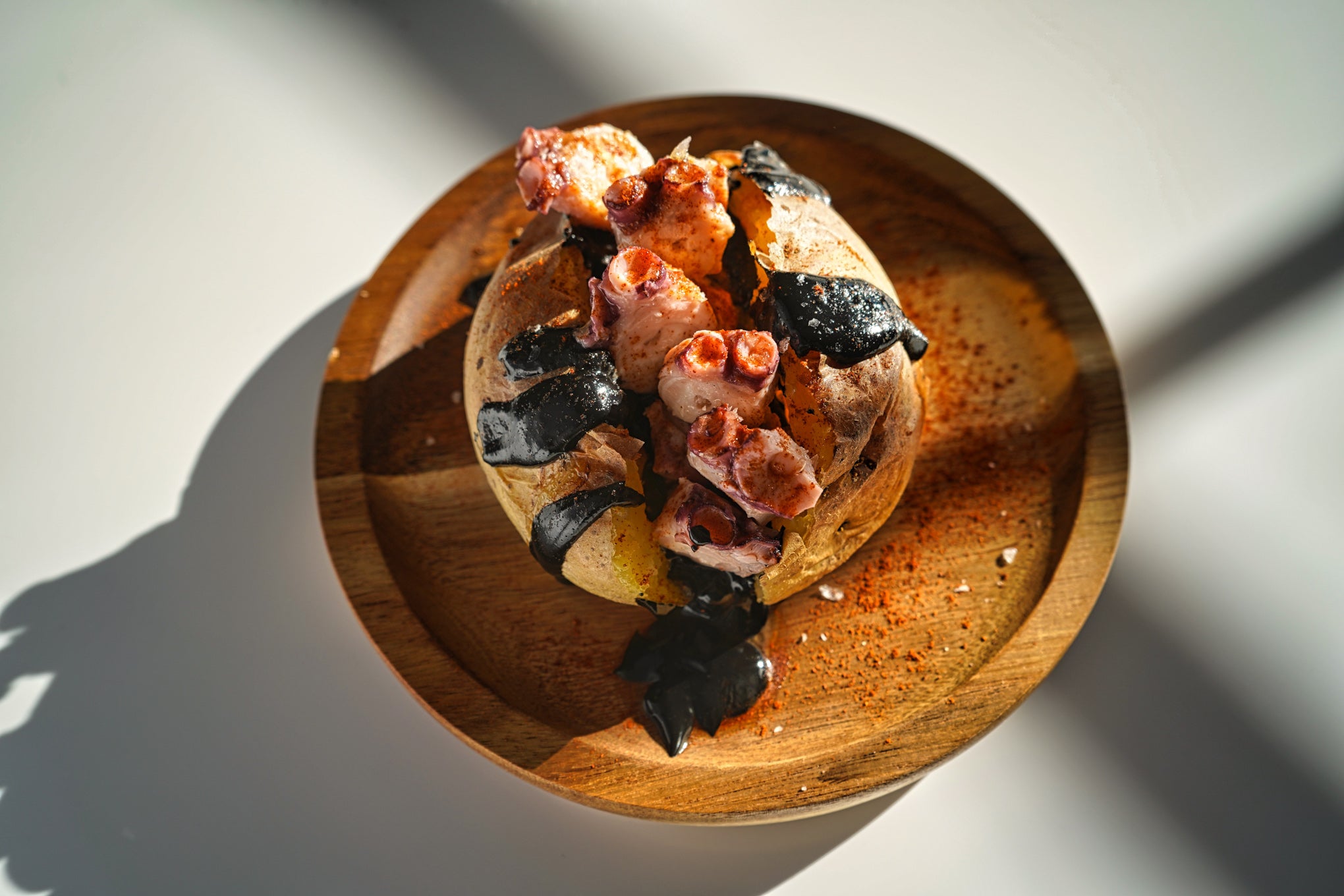 Octopus + Ink Baked Potato | Recipes | Conserva Culture